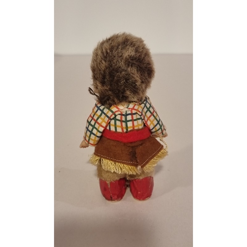 Gammel Mecki figur med ruskindsnederdel, h: 13 cm.